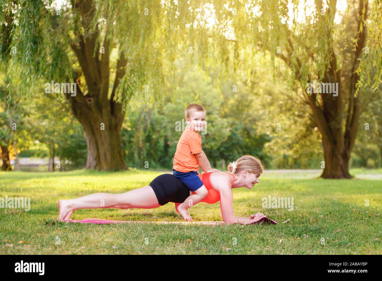 Family sport activity. Young Caucasian mother with child toddler boy ...