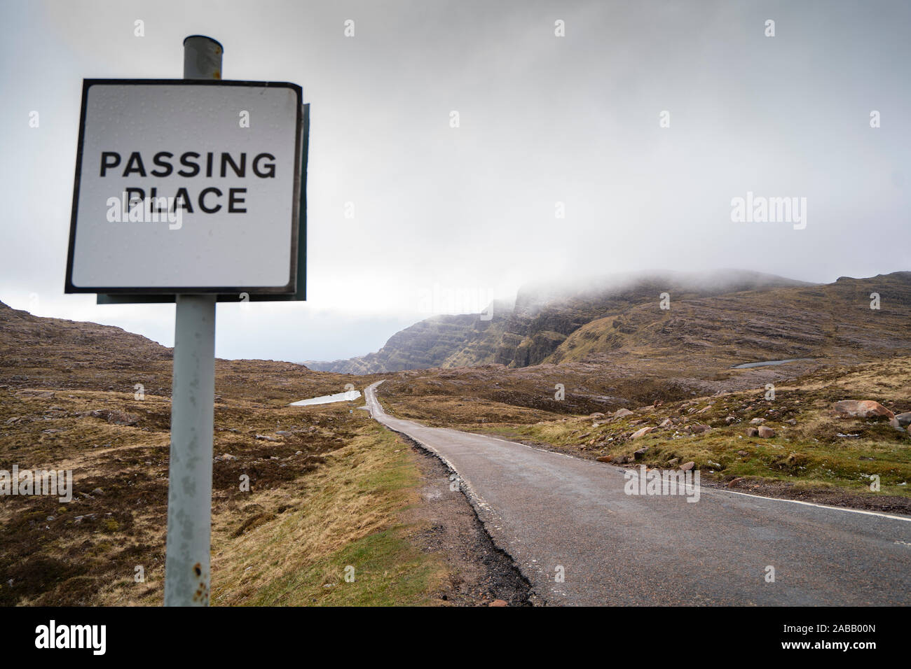View of single track road and passing place on Bealach na Ba pass on ...