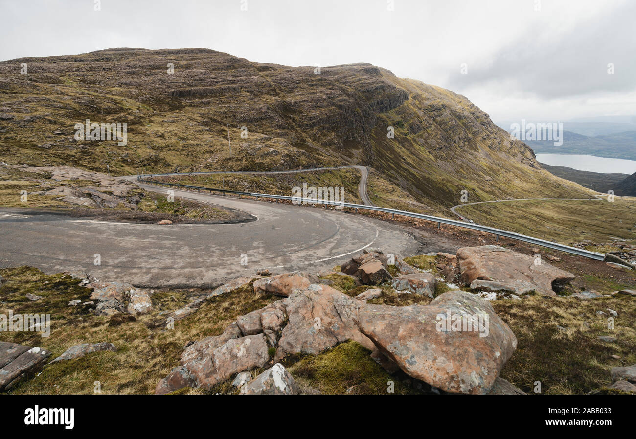 View of single track road and passing place on Bealach na Ba pass on ...