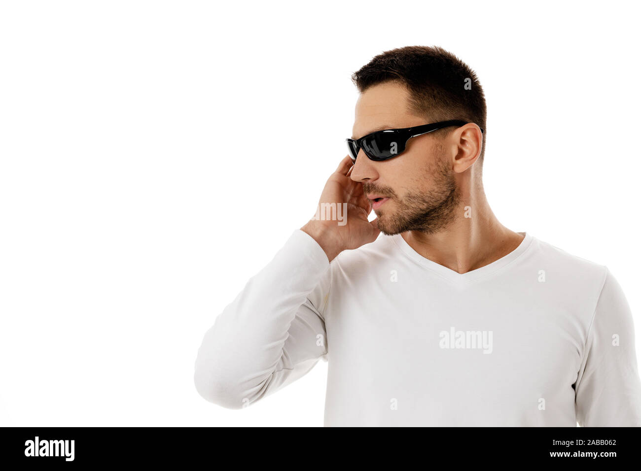handsome bearded bodyguard or secret agent man in sunglasses on white ...