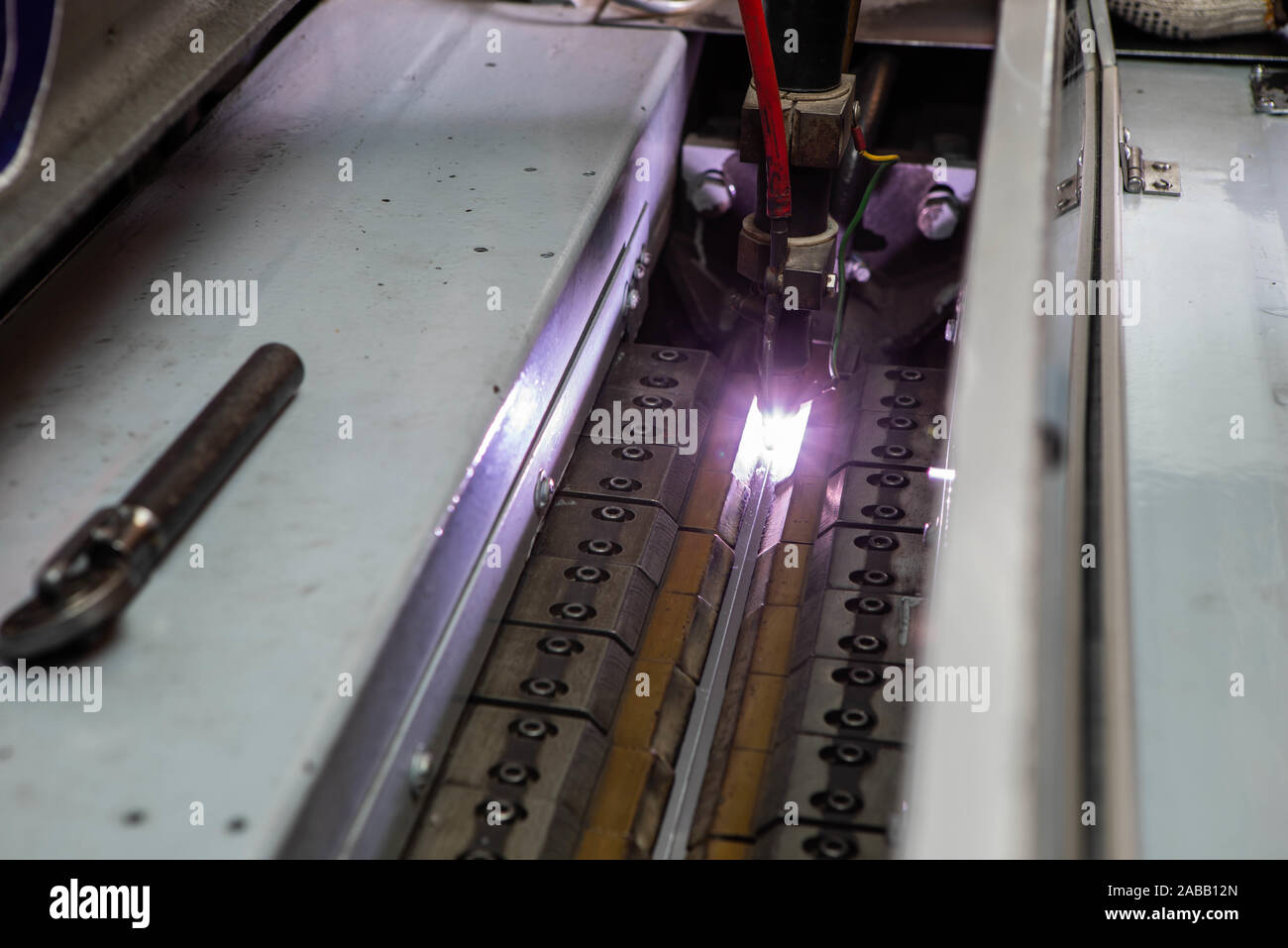 Welded seam. Overlap arc welding machine. Sparks Stock Photo - Alamy