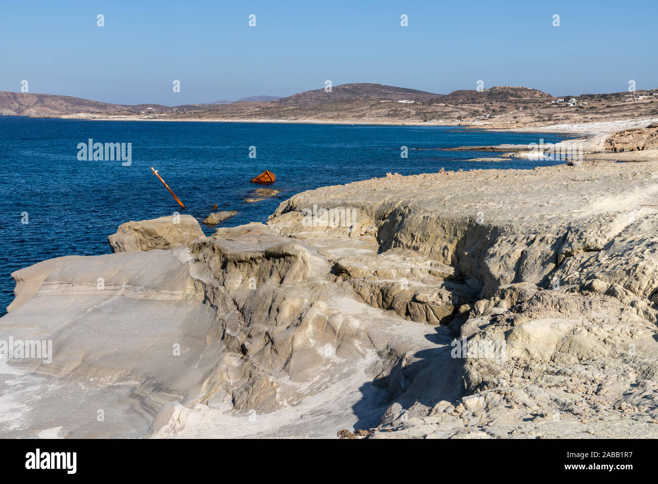 Cliffs and Parts of wrecked ship in Sarakiniko beach, Milos, Greece ...