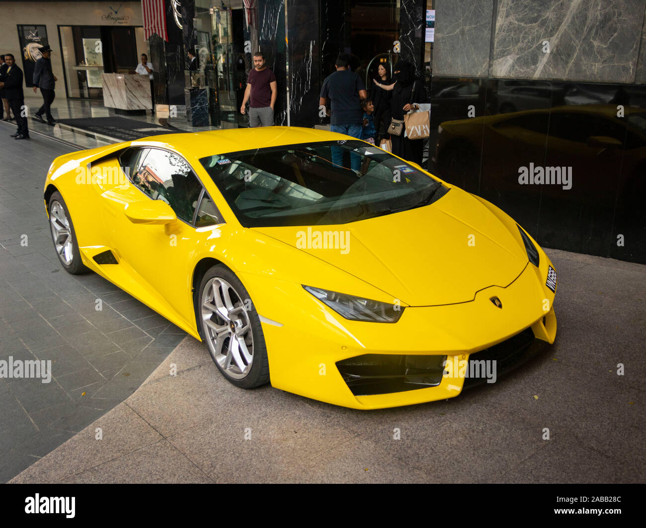 Gialo Yellow Lamborghini Huracan LP parked outside a hotel in Kuala ...