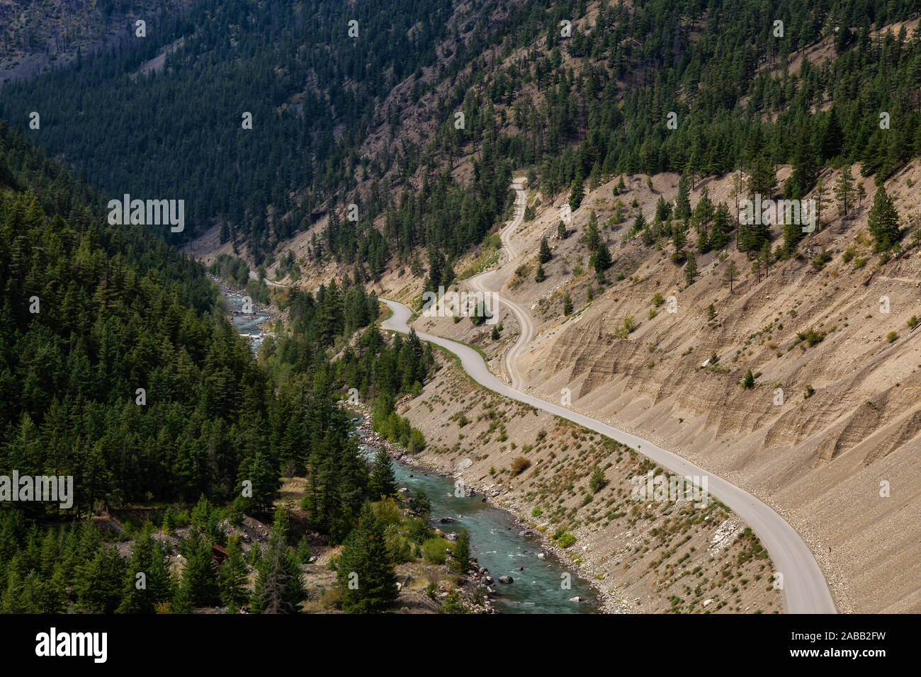 Aerial View of a Scenic Dirt Road towards Gold Bridge in the Valley ...