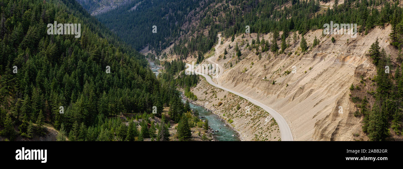 Aerial View of a Scenic Dirt Road towards Gold Bridge in the Valley ...