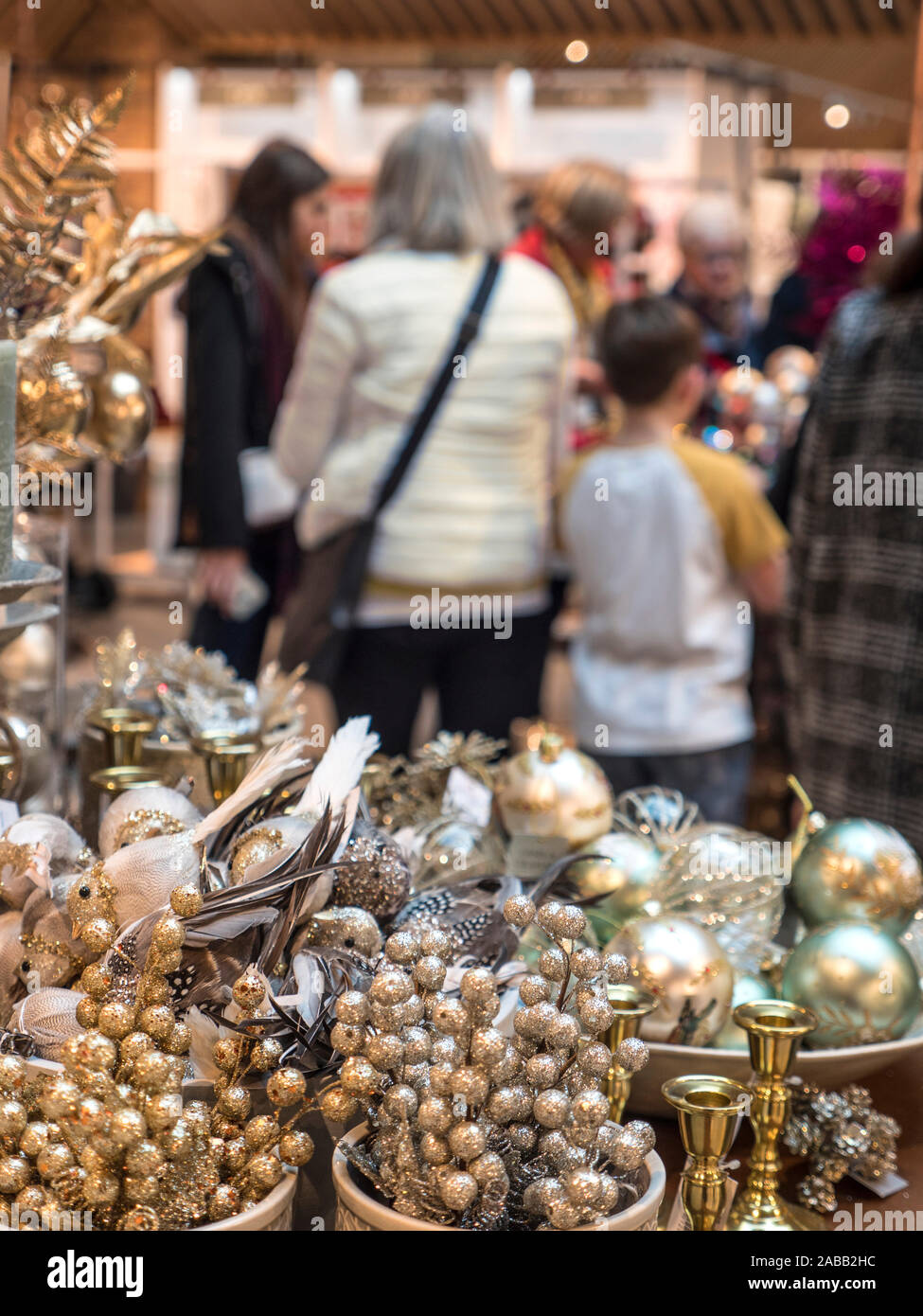 Christmas family shoppers browsing busy shops festive decorations ...