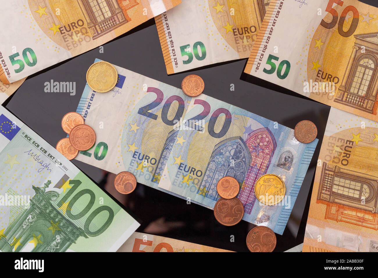 The picture shows the number 2020 made of 20 Euro bills surrounded by ...