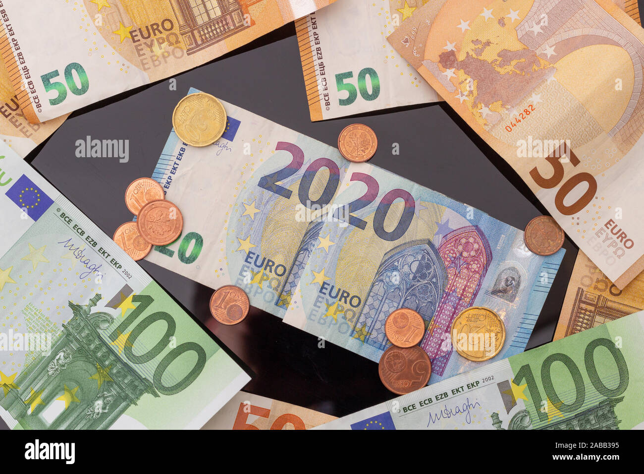 The picture shows the number 2020 made of 20 Euro bills surrounded by ...