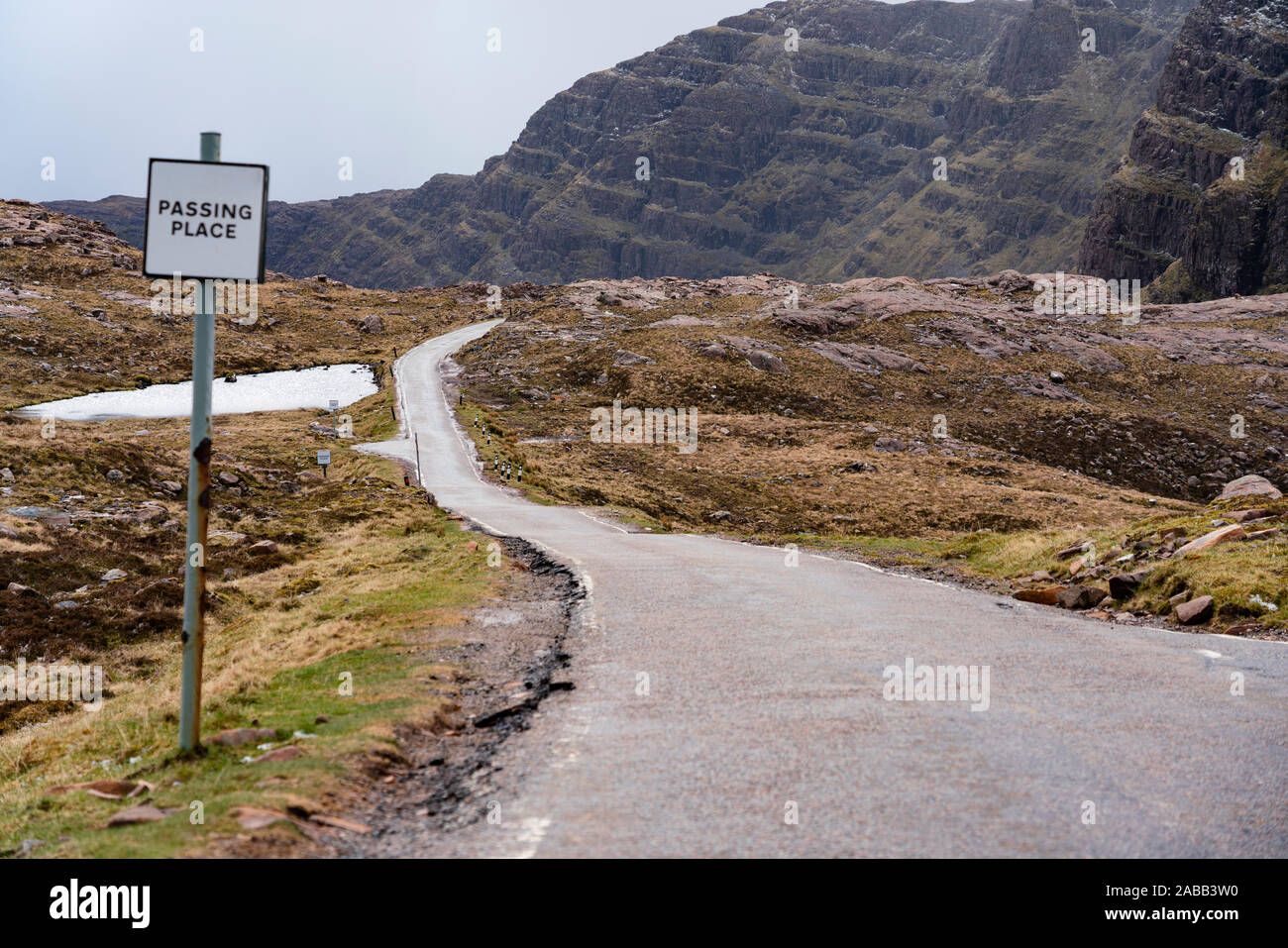 View of single track road and passing place on Bealach na Ba pass on ...
