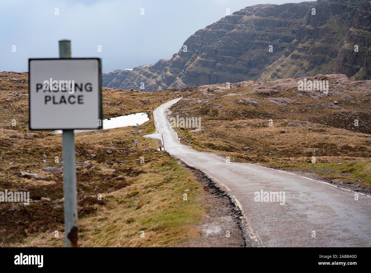 View of single track road and passing place on Bealach na Ba pass on ...