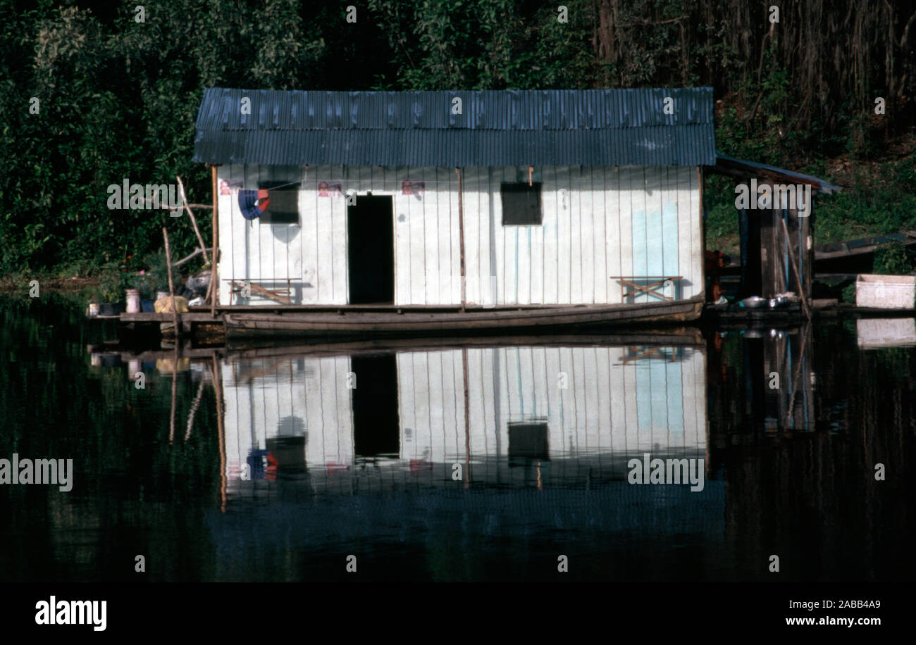 This riverside floating house in the Peruvian Amazon Basin rises and ...