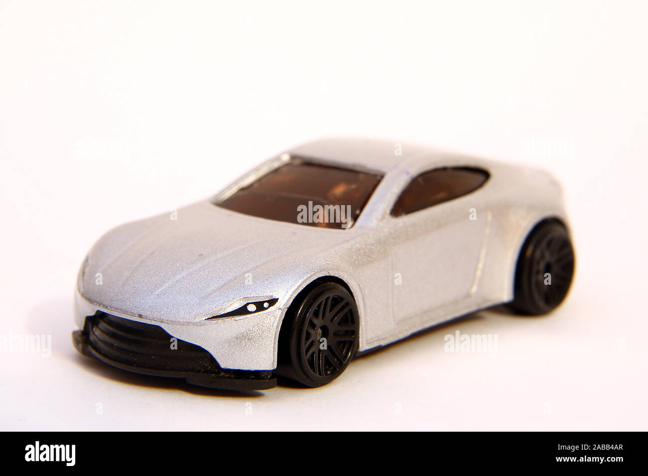 toy car . Collectible toy model silver sport car . Closeup of a silver ...