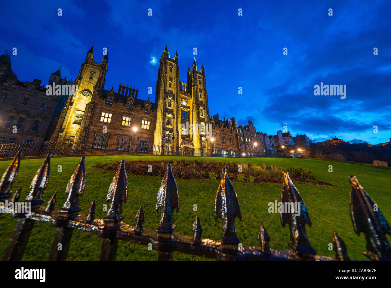 Night view of Edinburgh University New College building on The Mound in ...
