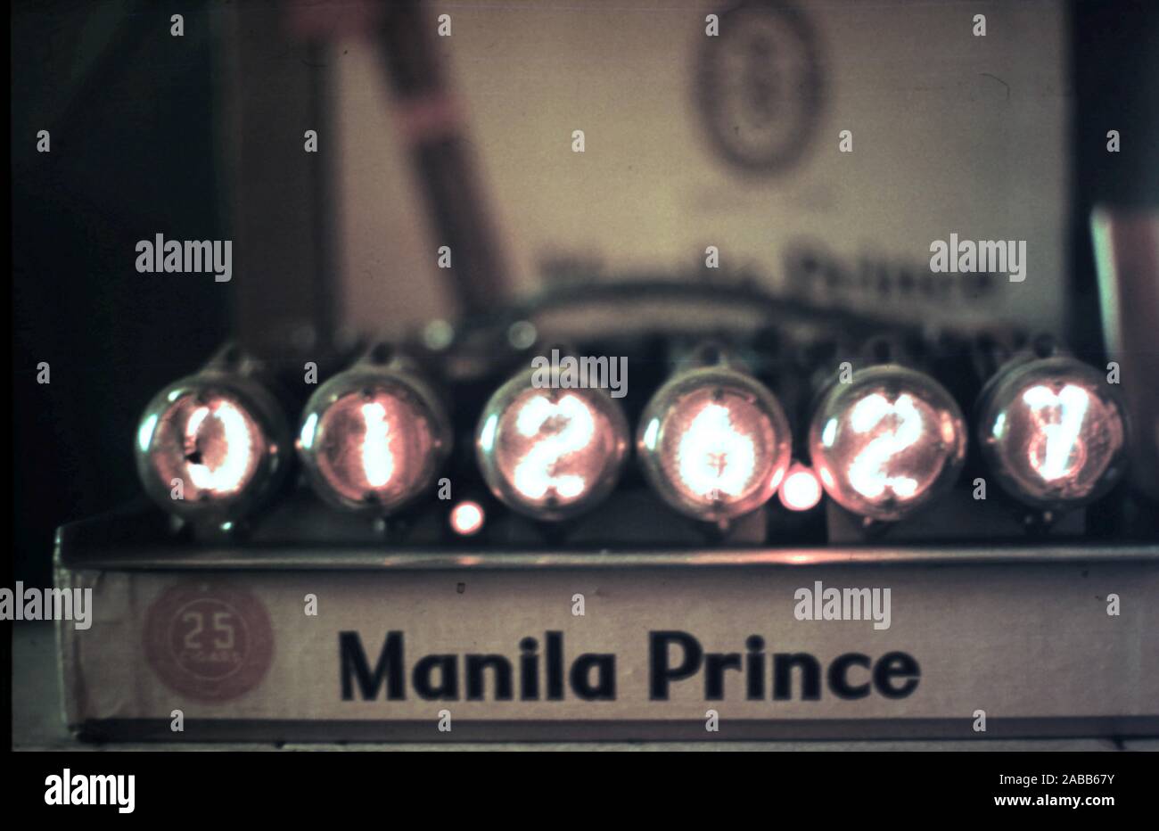 Homemade digital clock - time 01.26.27 - placed inside cigar box ...