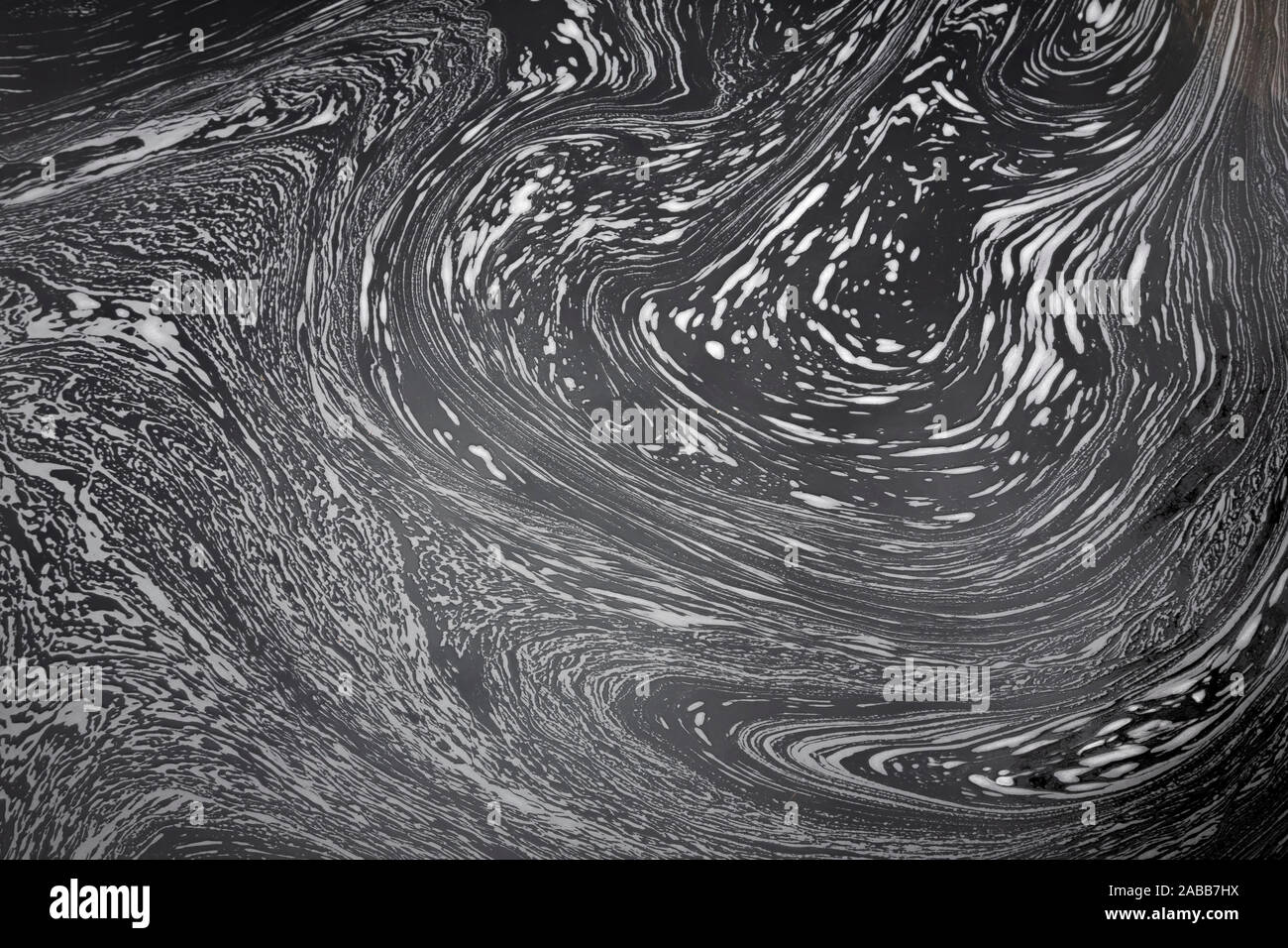 scummy swirls polluting the water Stock Photo - Alamy