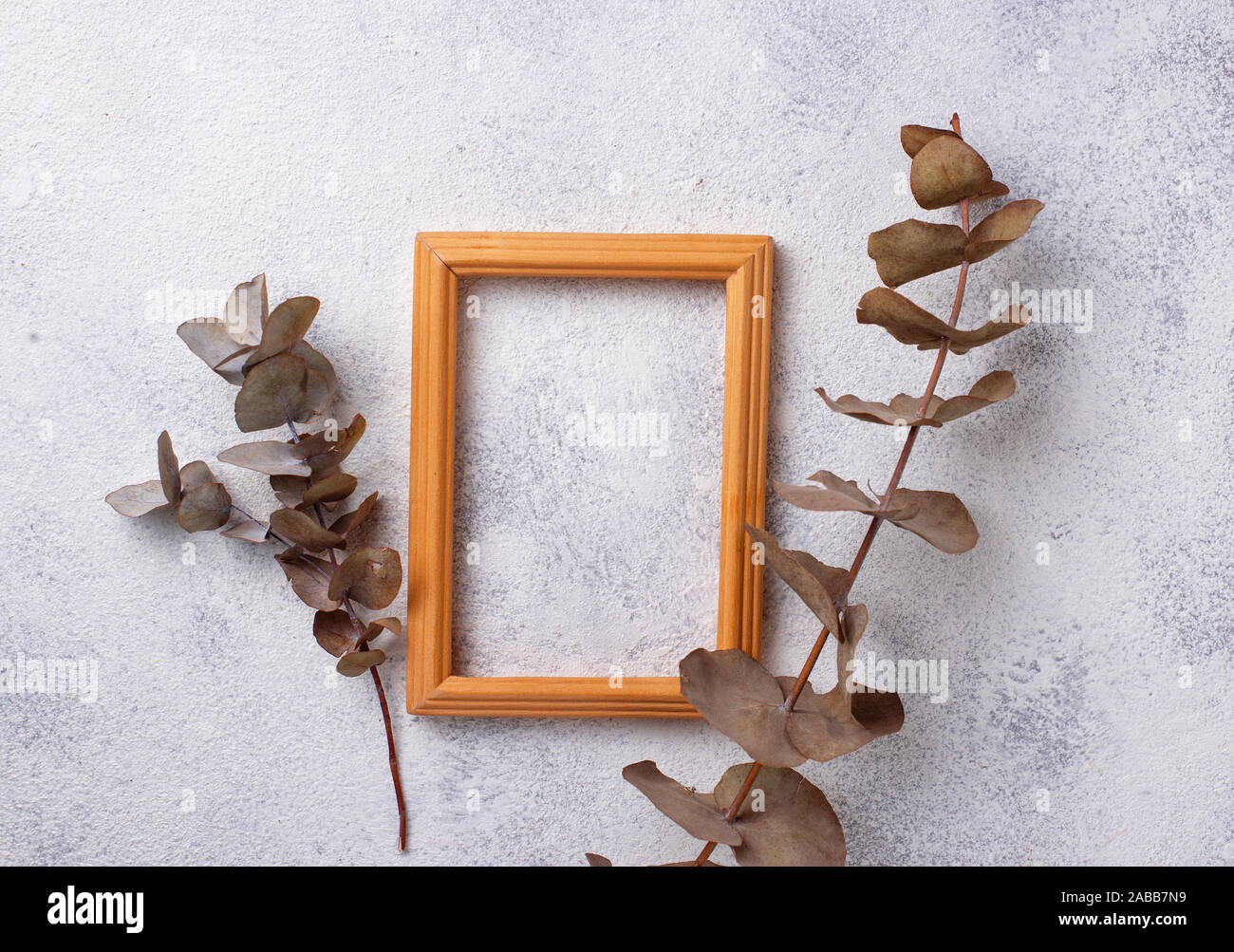 Wooden frame on light background Stock Photo - Alamy