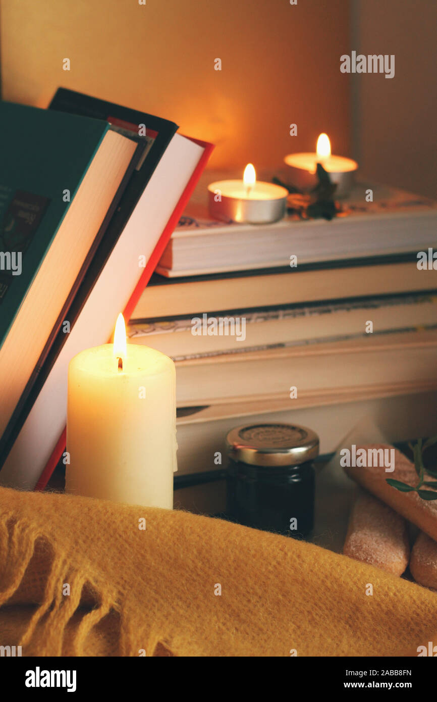 Reading books by candle light hi-res stock photography and images - Alamy