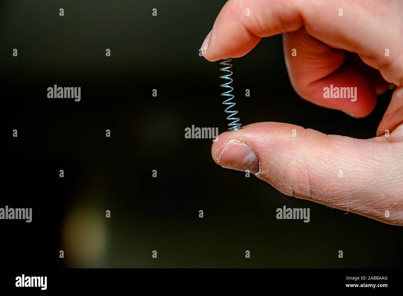 Compressing spring hi-res stock photography and images - Alamy