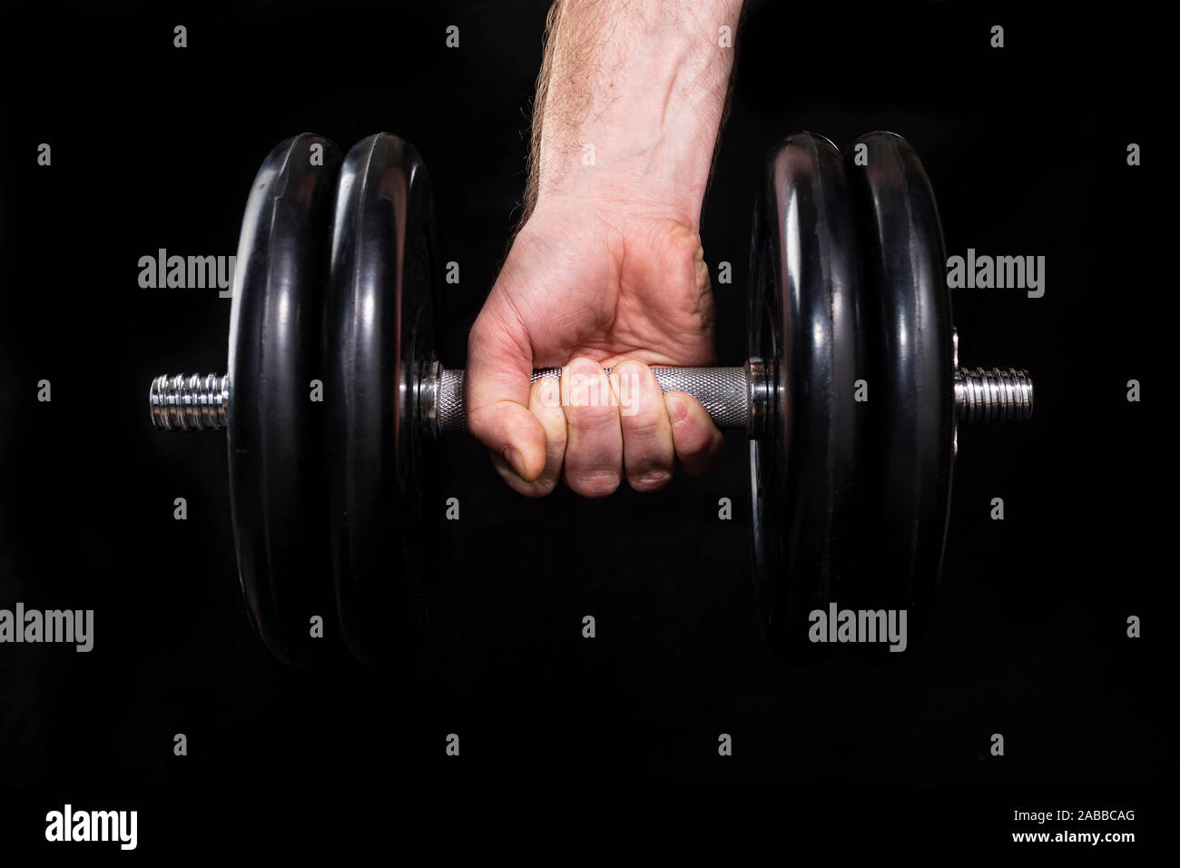 Male holding dumbbell bar hi-res stock photography and images - Alamy