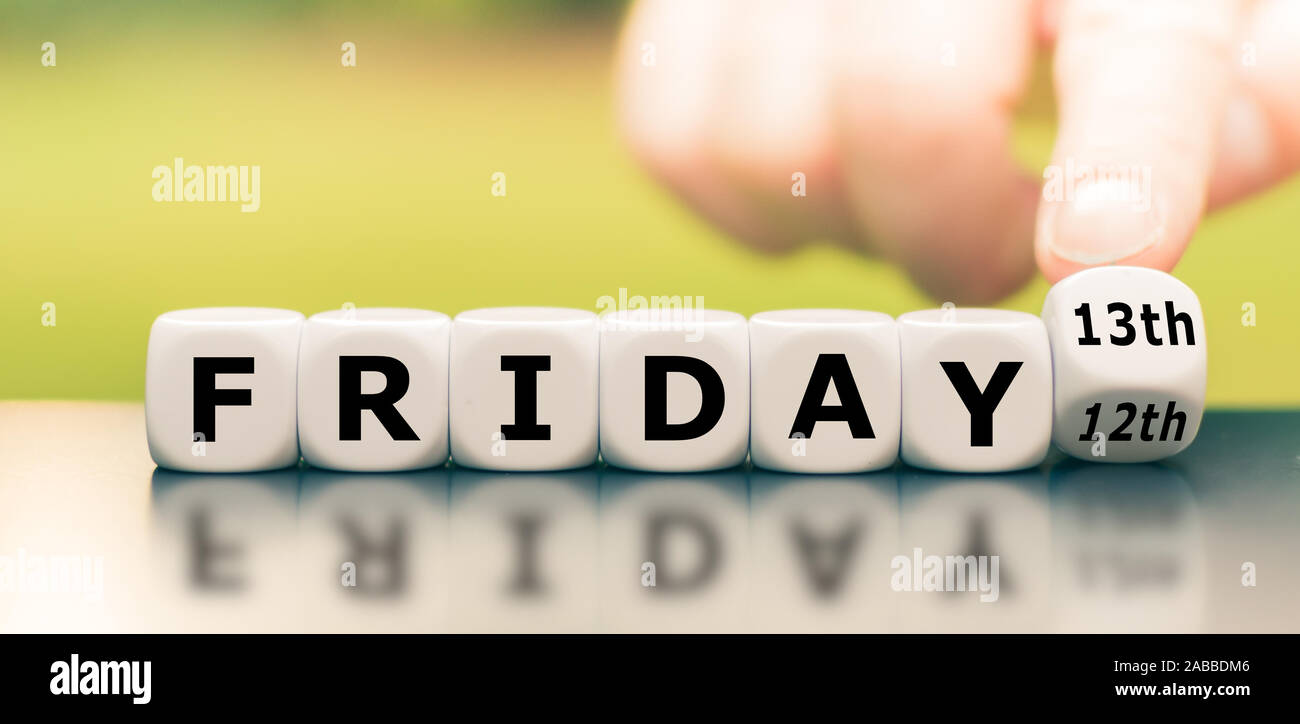 Hand turns a dice and changes the expression "friday 12th" to "friday ...