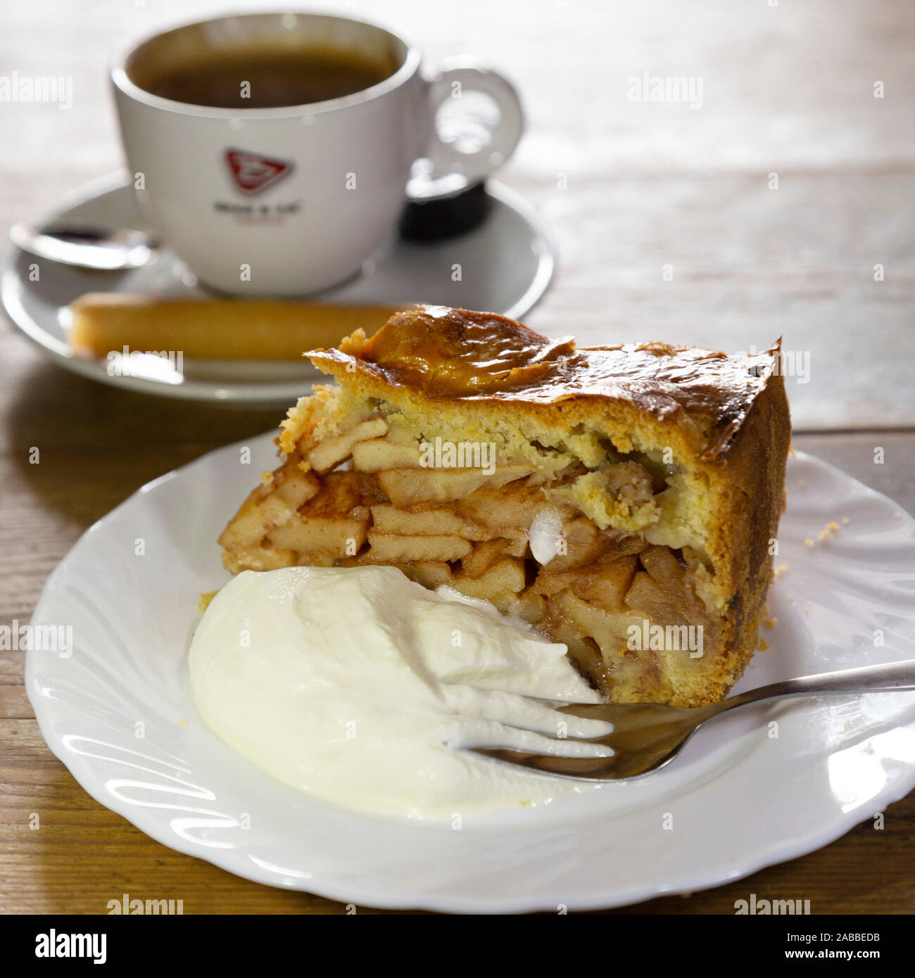 The traditional Dutch dish of appeltaart (apple pie) served with ...