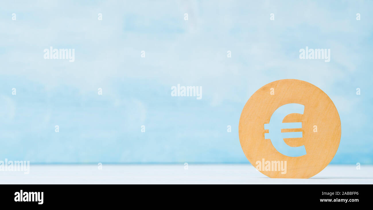 Wooden Euro sign on wood background. Symbol of european money. business ...