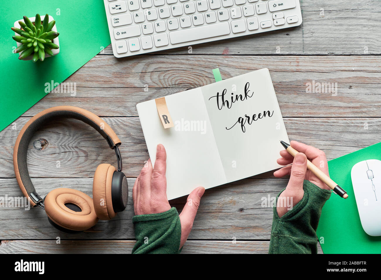 Think green, zero waste creative flat lay. Top view with hands holding ...