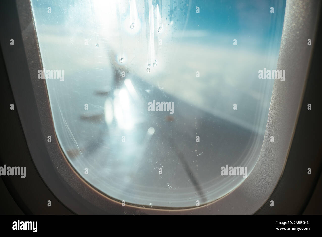 Aiplane windows view on aircraft wing from the cabin, skyline ...