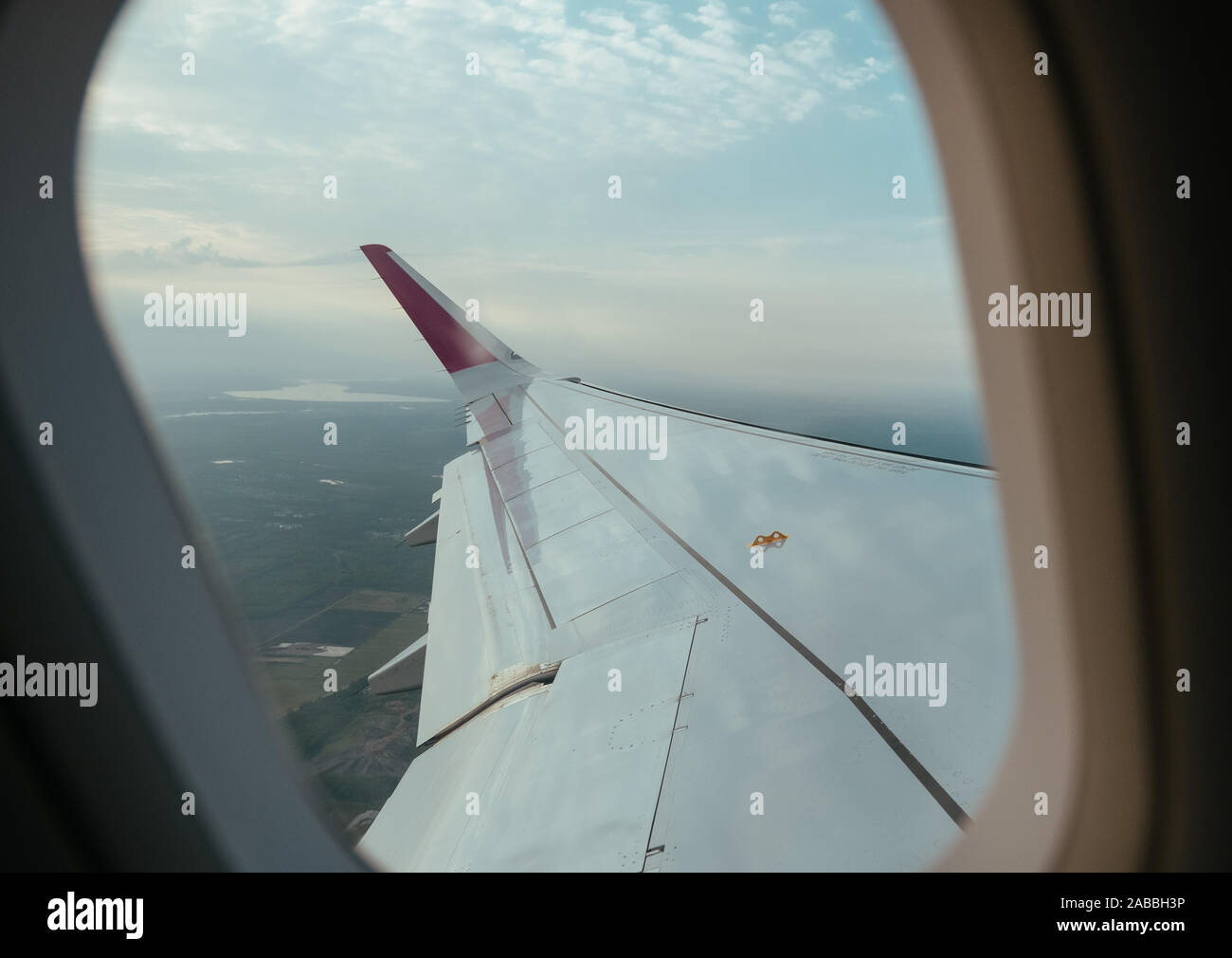 Aiplane windows view on aircraft wing from the cabin, skyline ...
