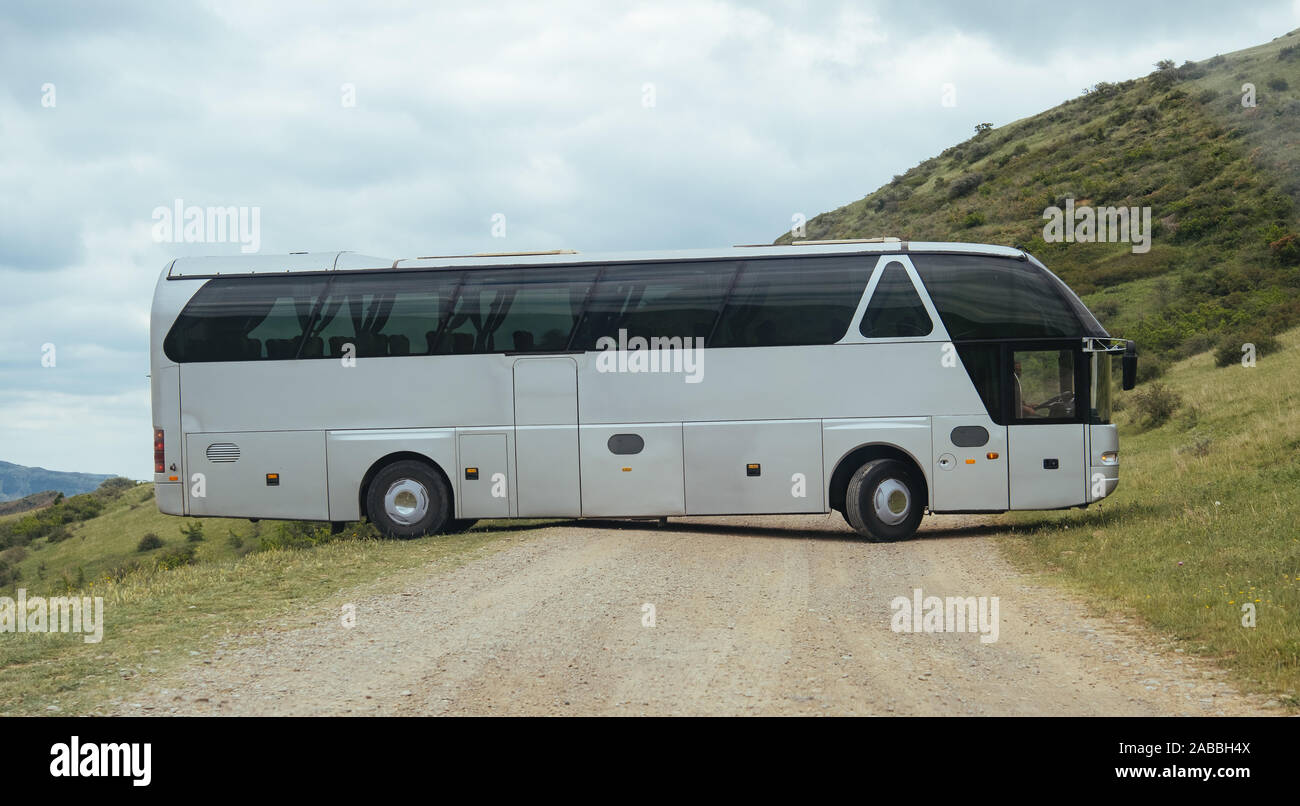 White BUS on the road in Geogrian Mountains Stock Photo - Alamy