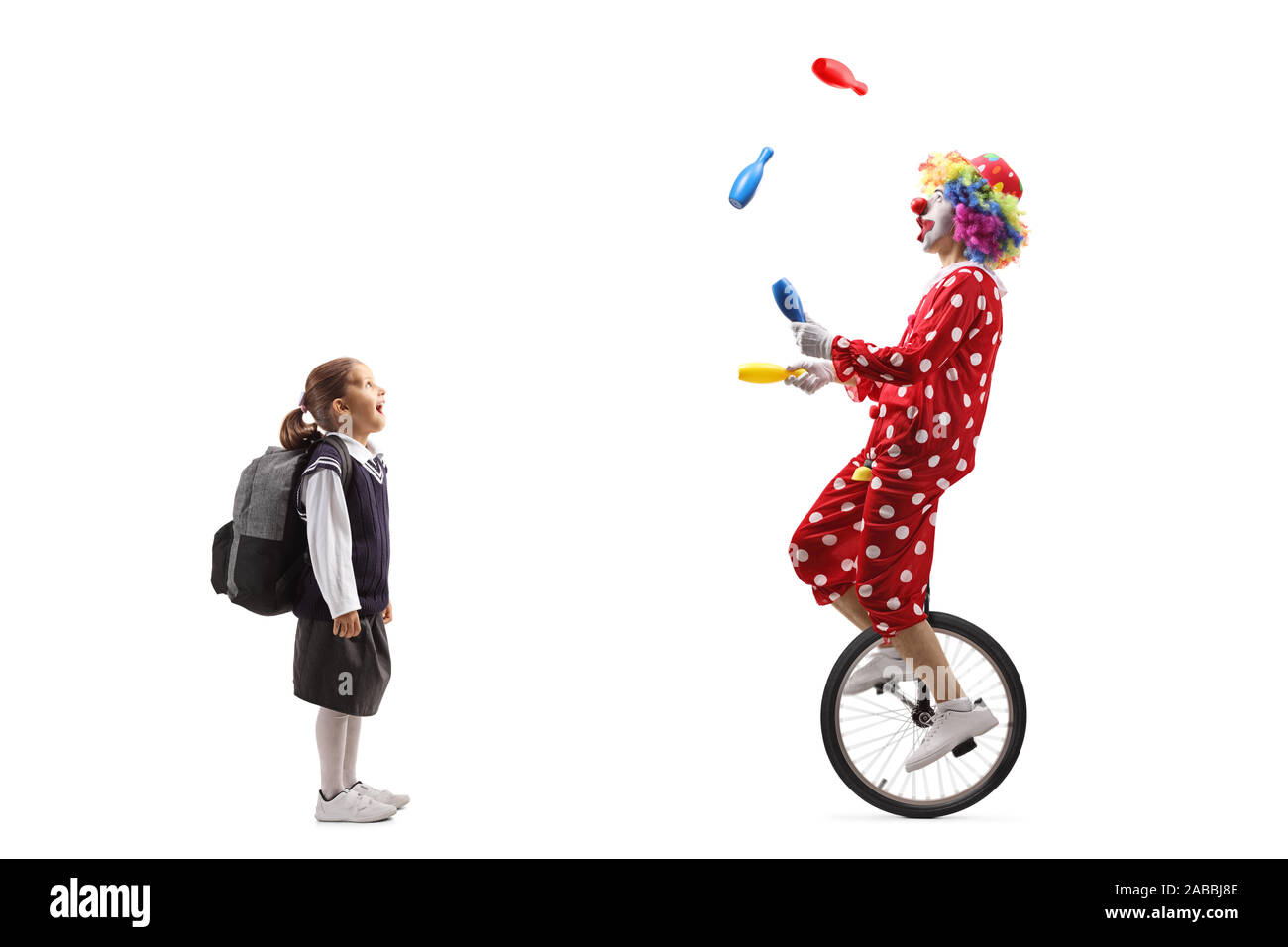 Full length shot of an excited little schoolgirl looking at a mime ...