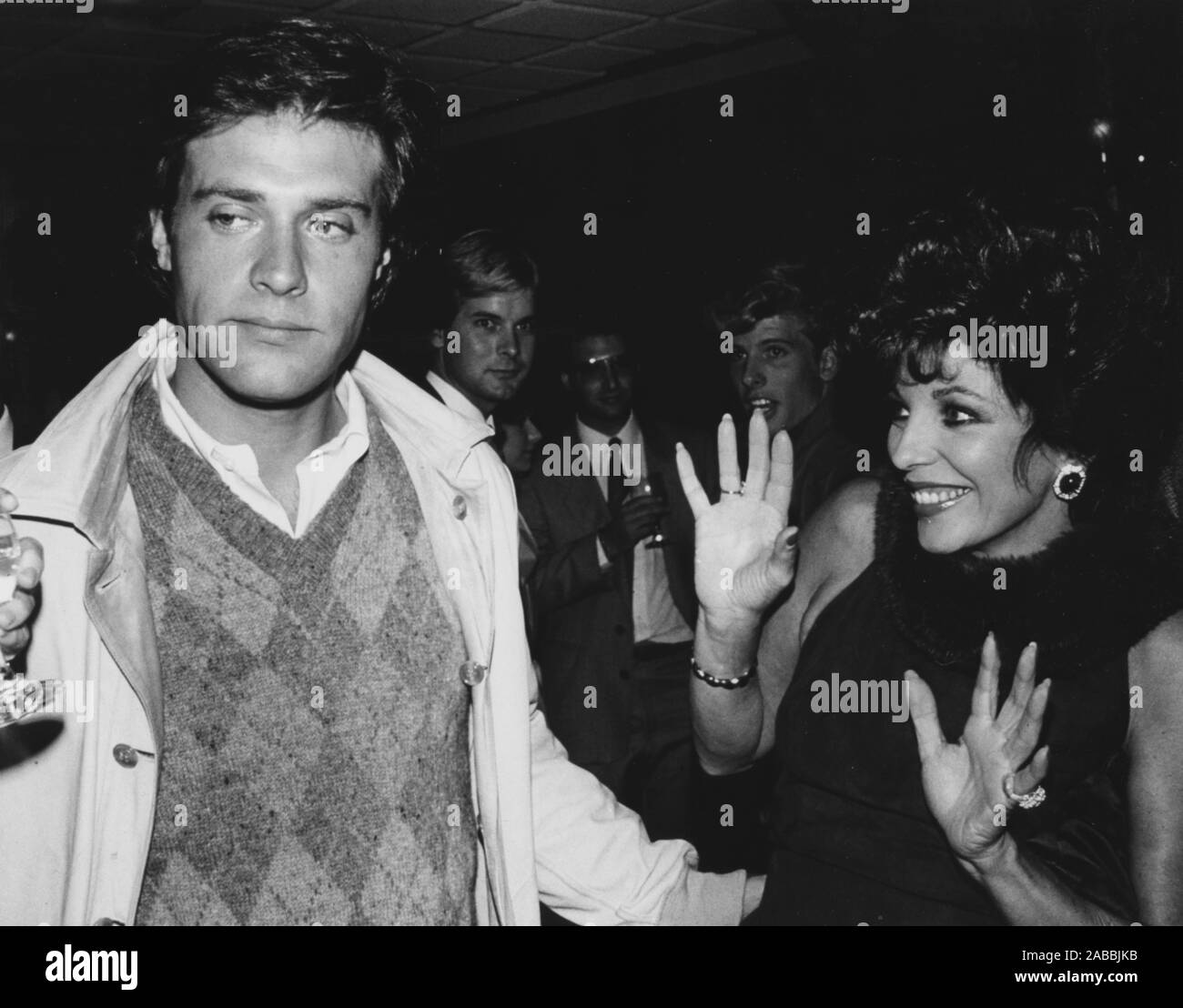 Los Angeles.CA.USA. LIBRARY. John James and Joan Collins at a party at ...