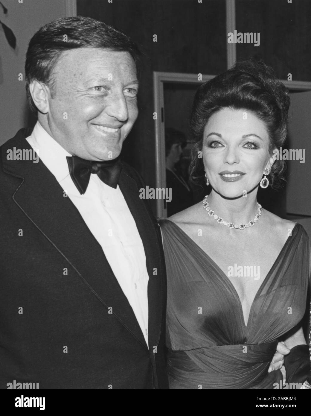 Los Angeles.CA.USA. LIBRARY. Ron Kass, Joan Collins at the 1983 Golden ...
