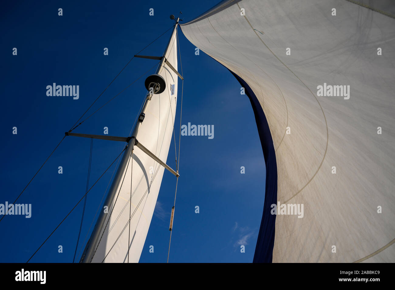 Sailboat mast with sails deployed against the sky in Spain Stock Photo ...