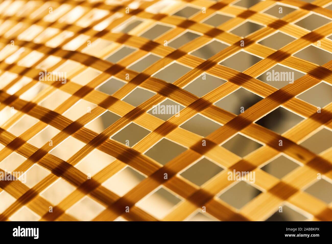 Woven bamboo wicker geometric structure curved Stock Photo - Alamy