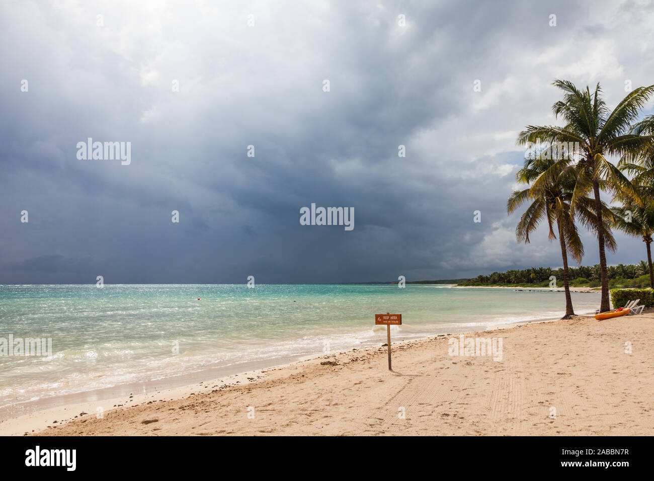 Threatening storm clouds over a resort beach near Tulum on the Mayan ...
