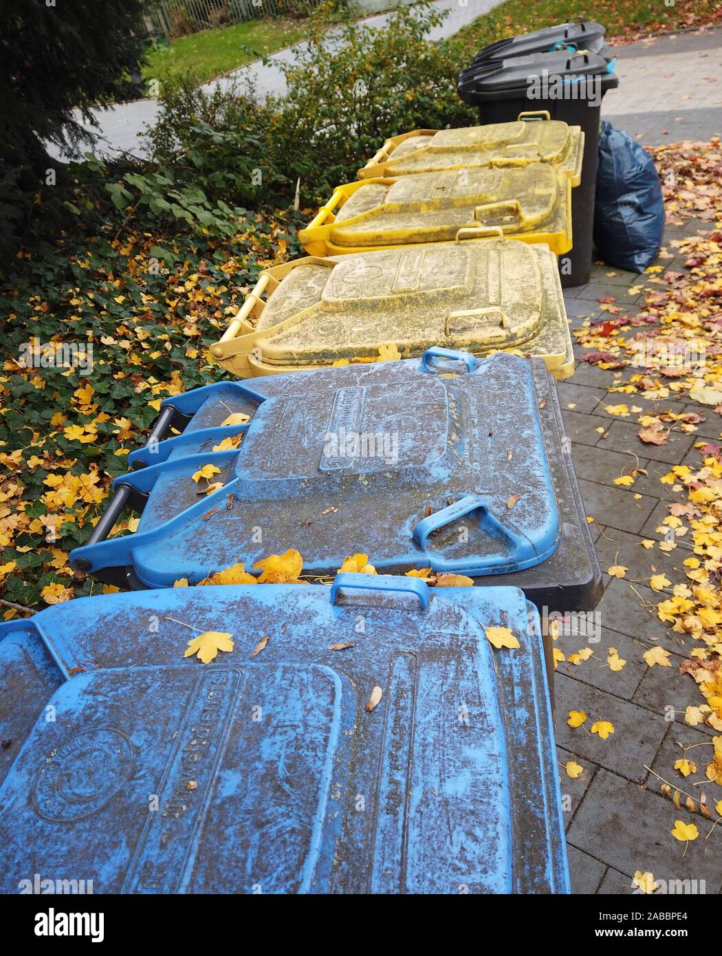 Bonn Germany, 12 November 2019: Lids of trash bins installed outside in ...