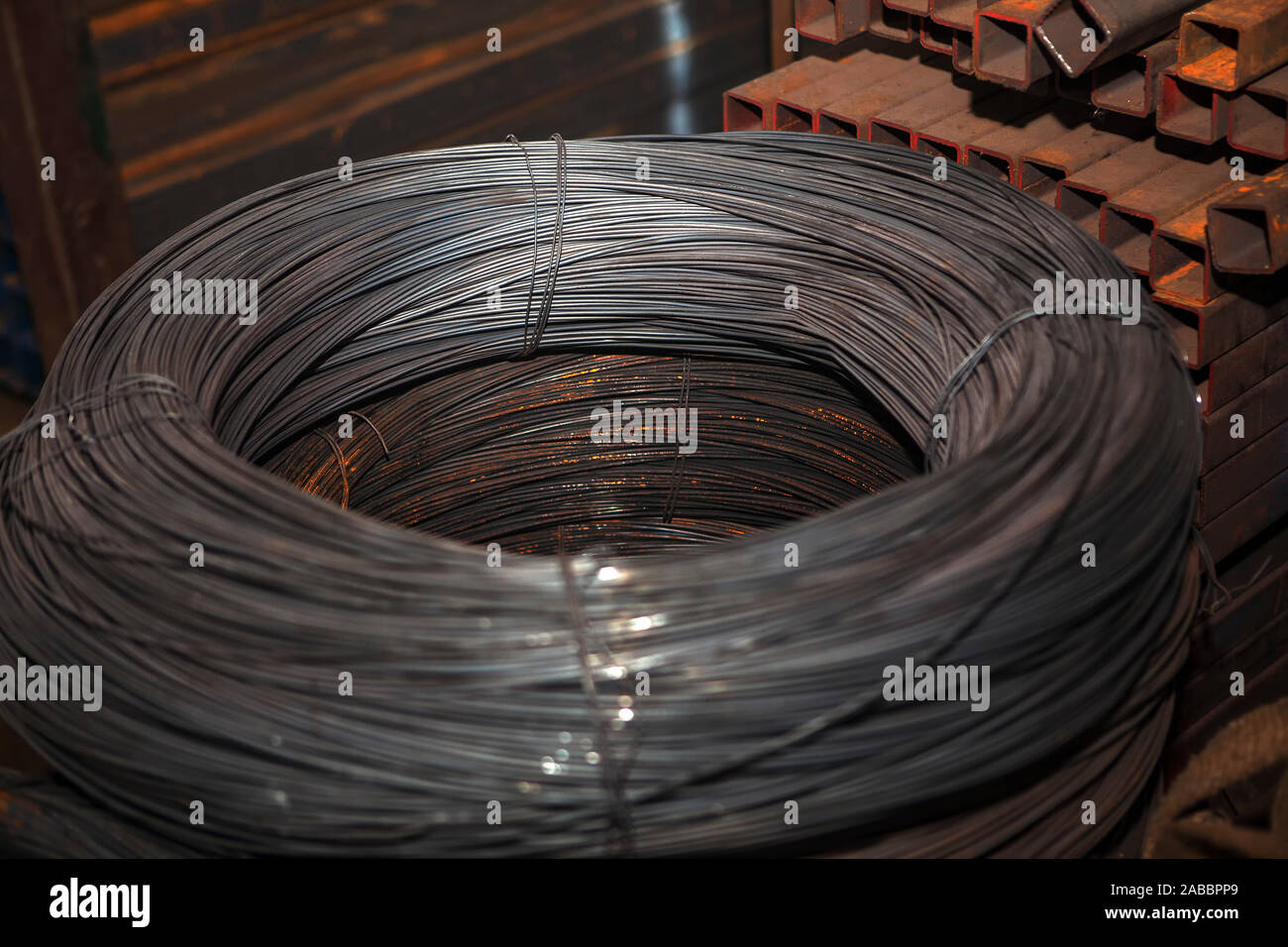 Stainless steel wire rolls in warehouse store Stock Photo - Alamy