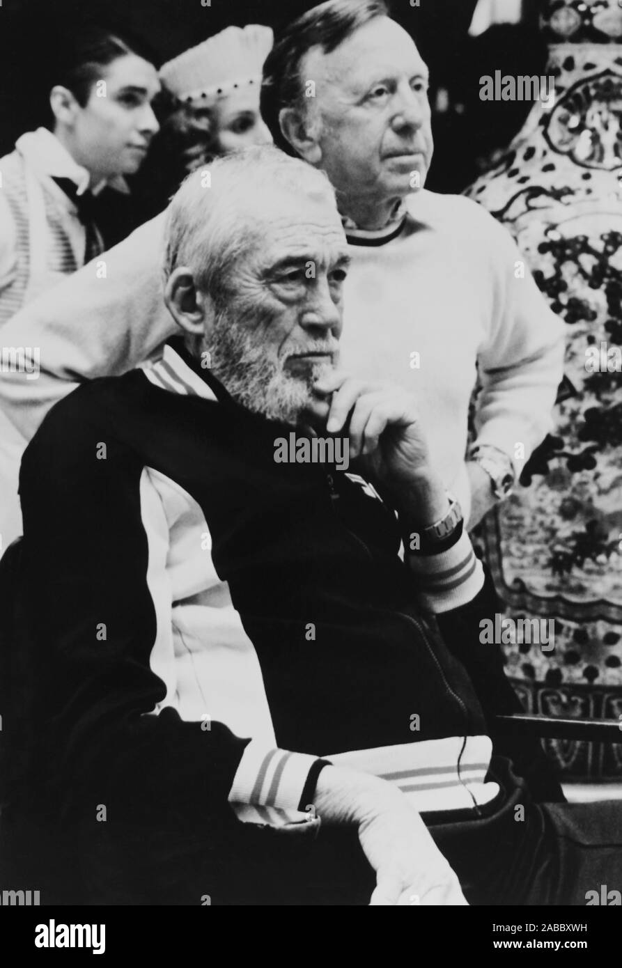 ANNIE, from left: director John Huston, producer Ray Stark on set, 1982 ...