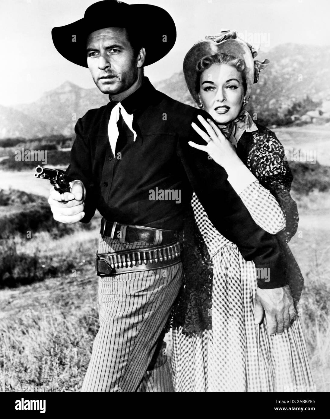 BADMAN'S COUNTRY, from left, George Montgomery, Karin Booth, 1958 Stock ...