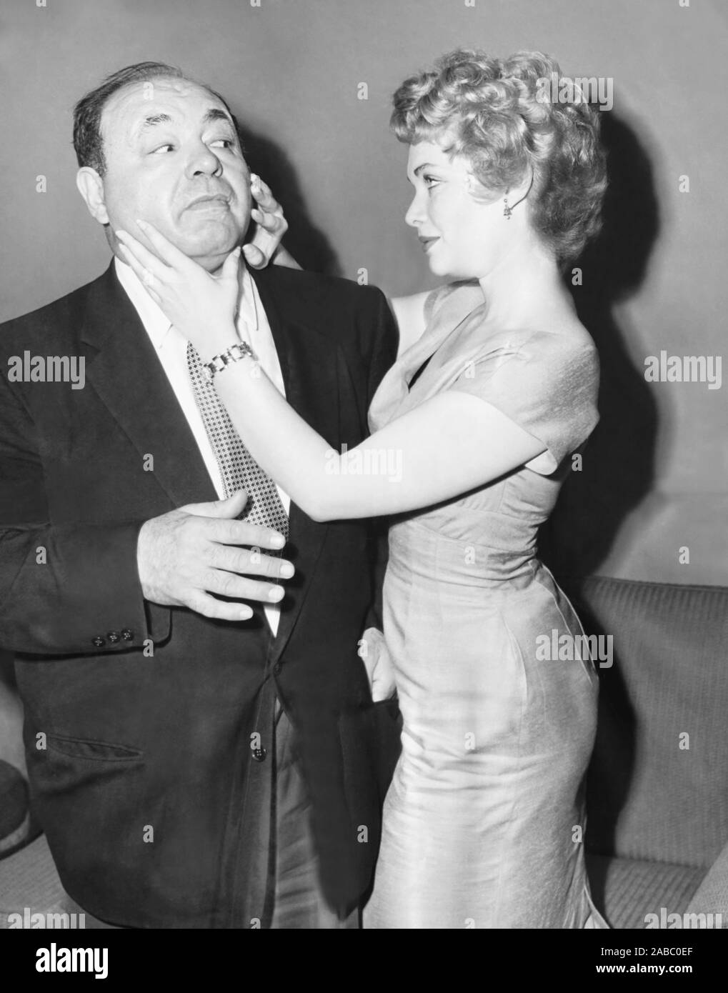 THE BEST THINGS IN LIFE ARE FREE, from left: Tony Galento, Roxanne Arlen on set, 1956, TM ...