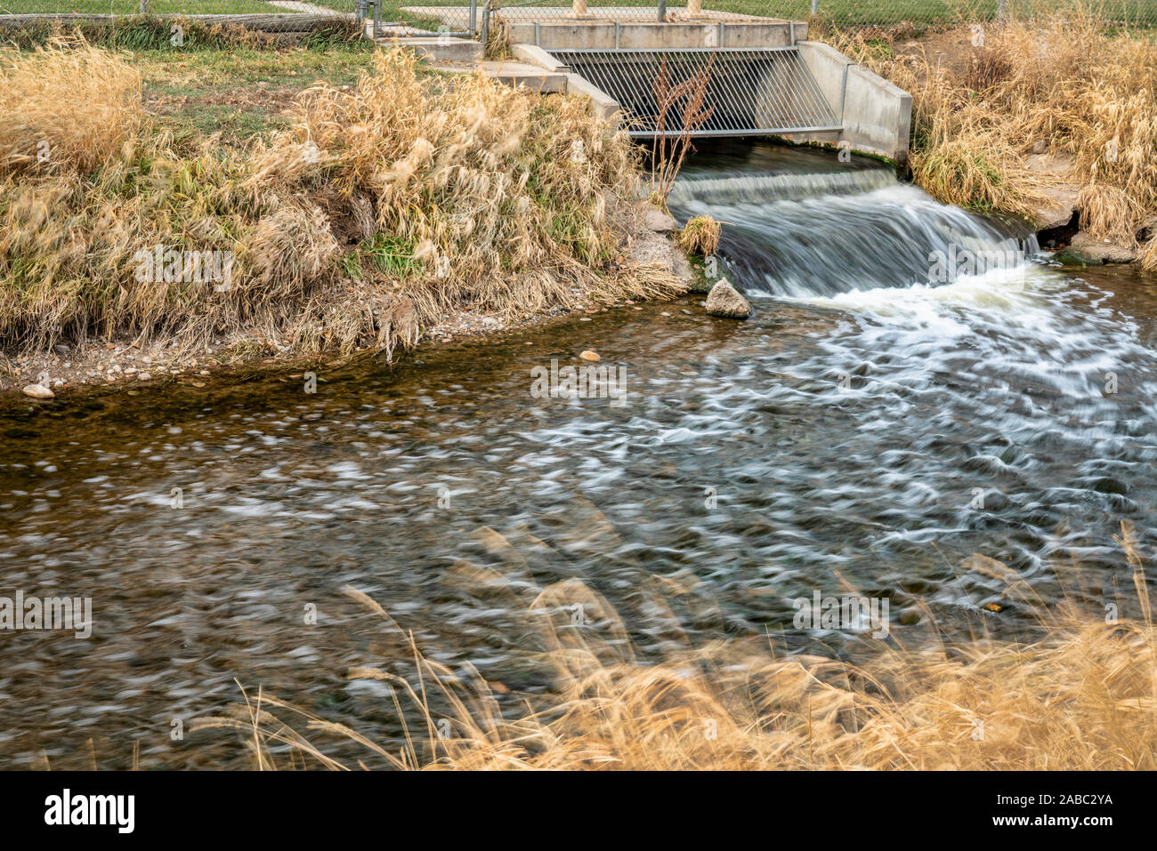 Processed and cleaned sewage flowing out from water reclamation ...