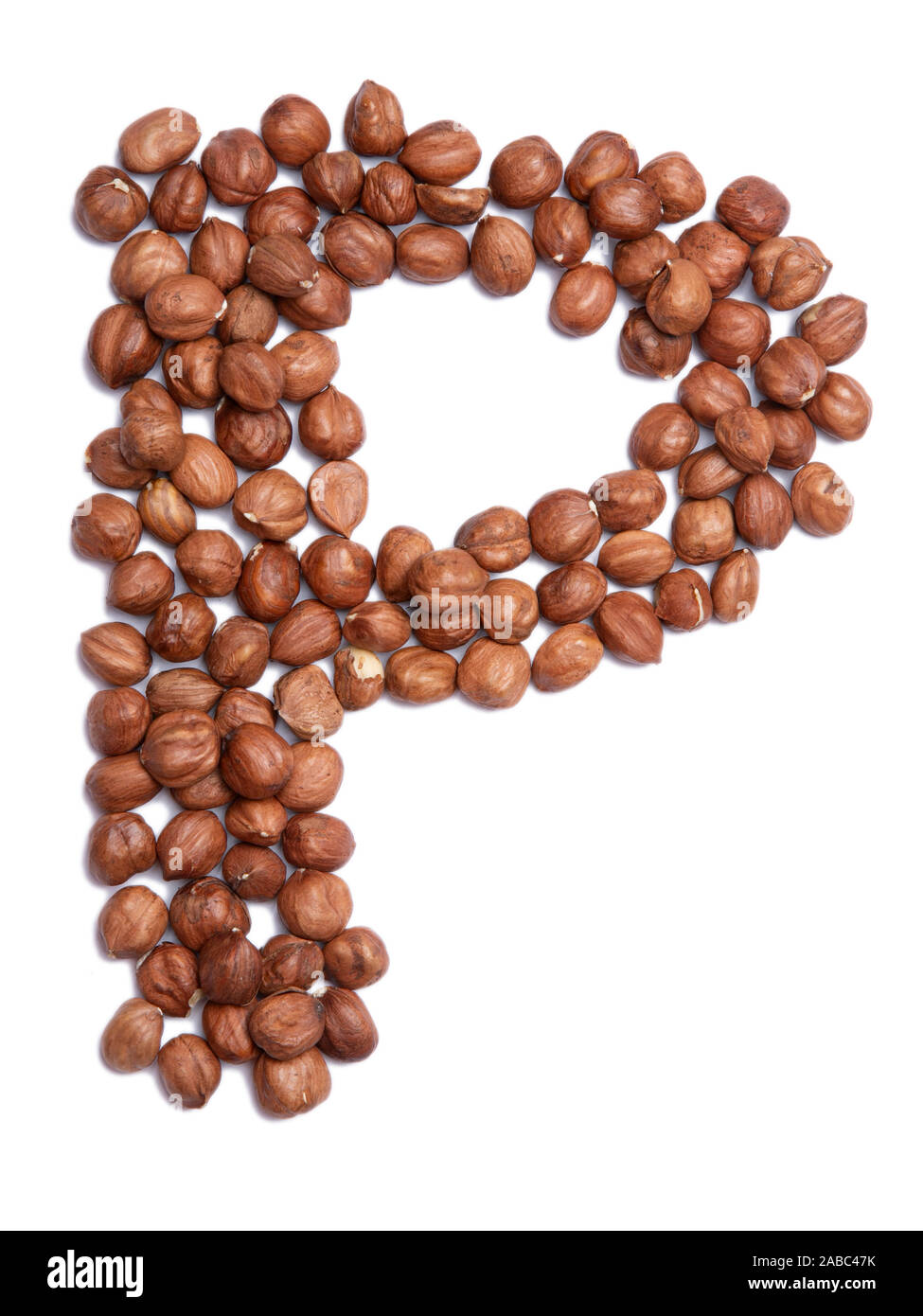 Letter P of the English alphabet from from hazelnut on a white isolated ...