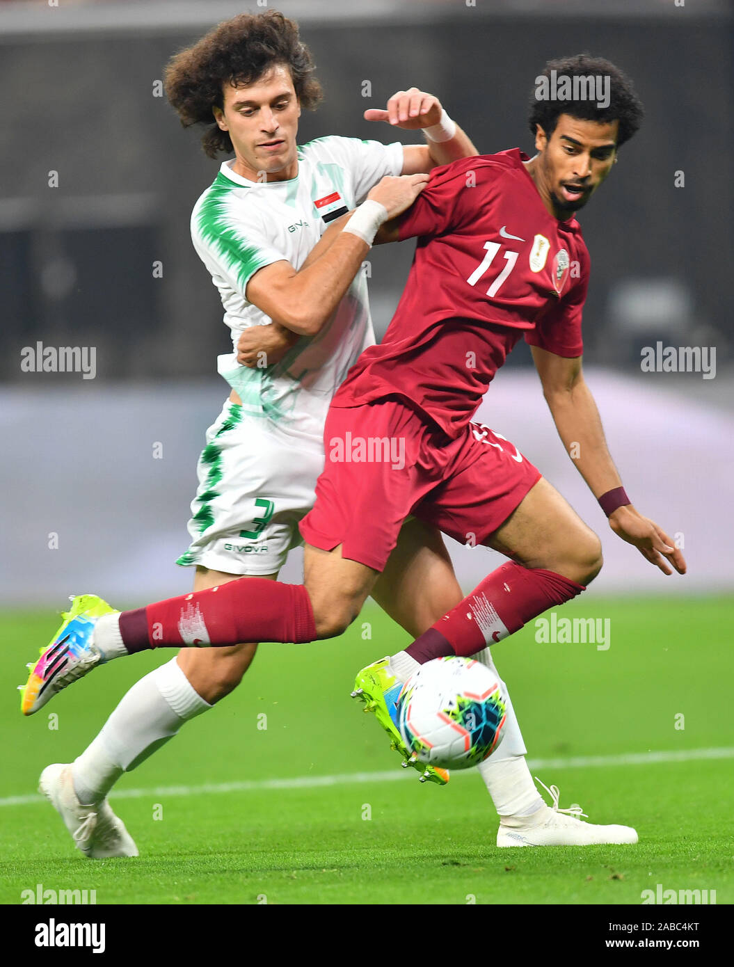 Doha, Capital of Qatar. 26th Nov, 2019. Mostafa Maslukhi (L) of Iraq ...