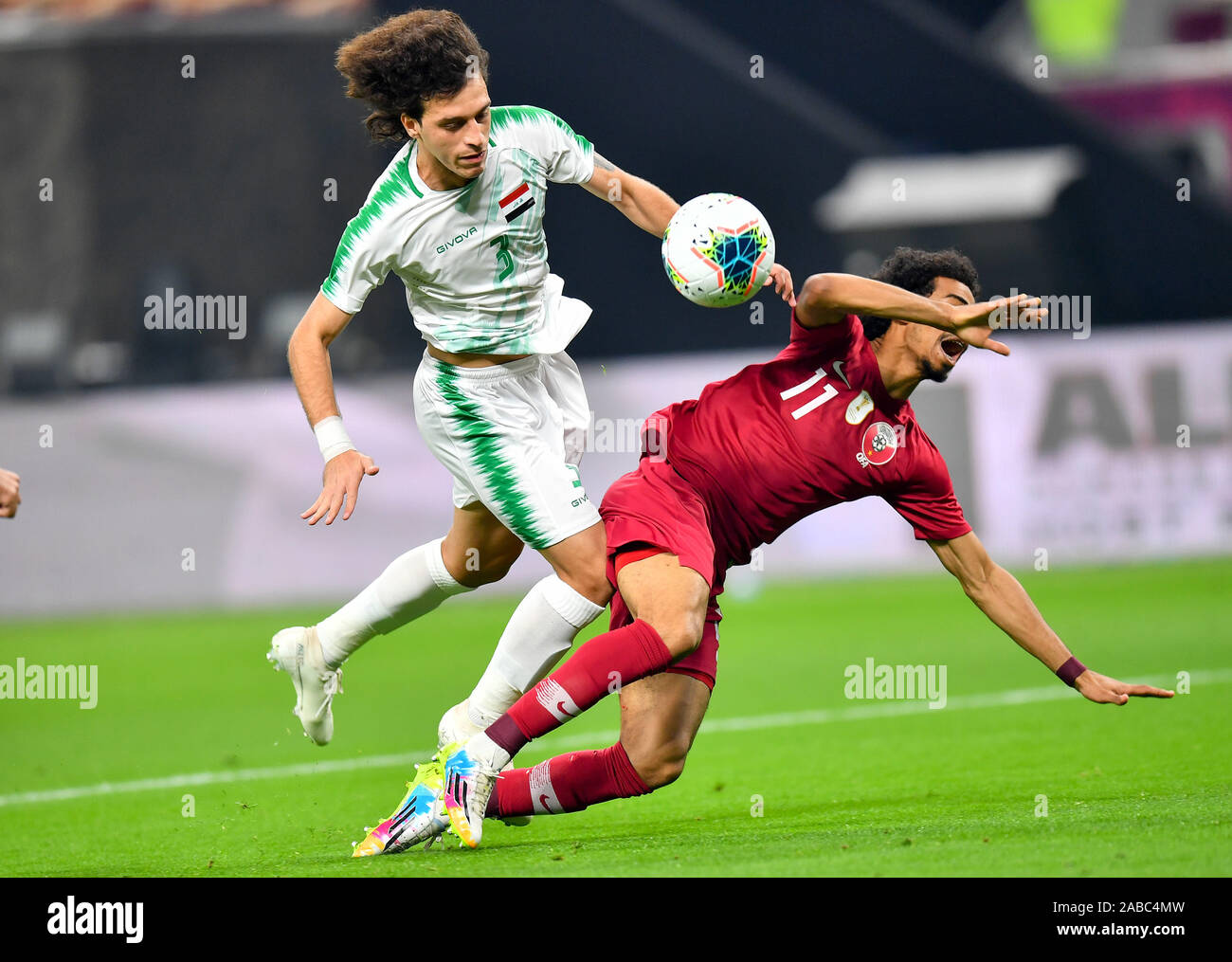 Doha, Qatar. 26th Nov, 2019. Mostafa Maslukhi (L) of Iraq vies with ...