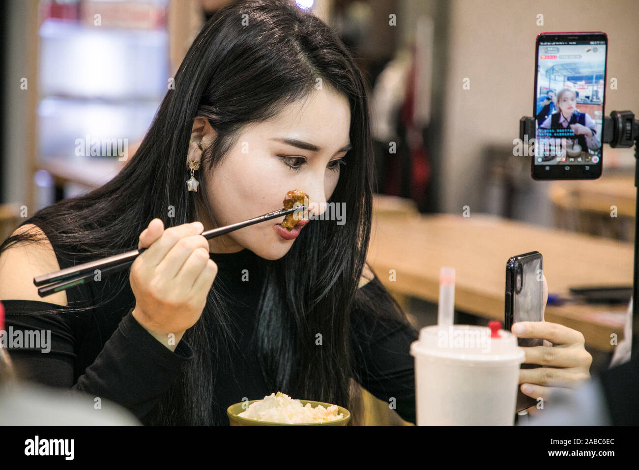 Applicants live-stream while eating at the restaurant as part of the ...
