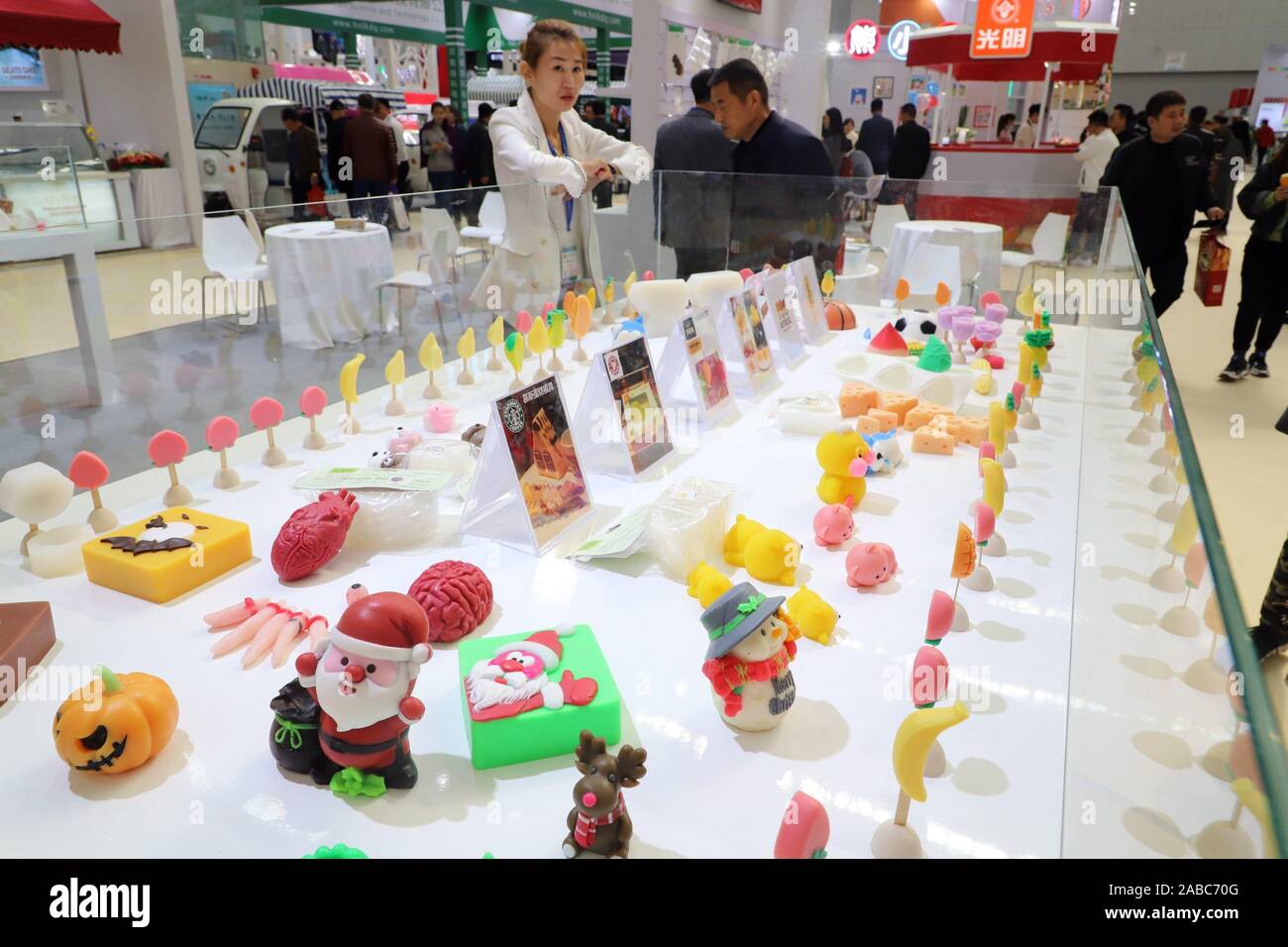 People look at the ice-cream at the 22nd Ice-cream and Frozen Food ...