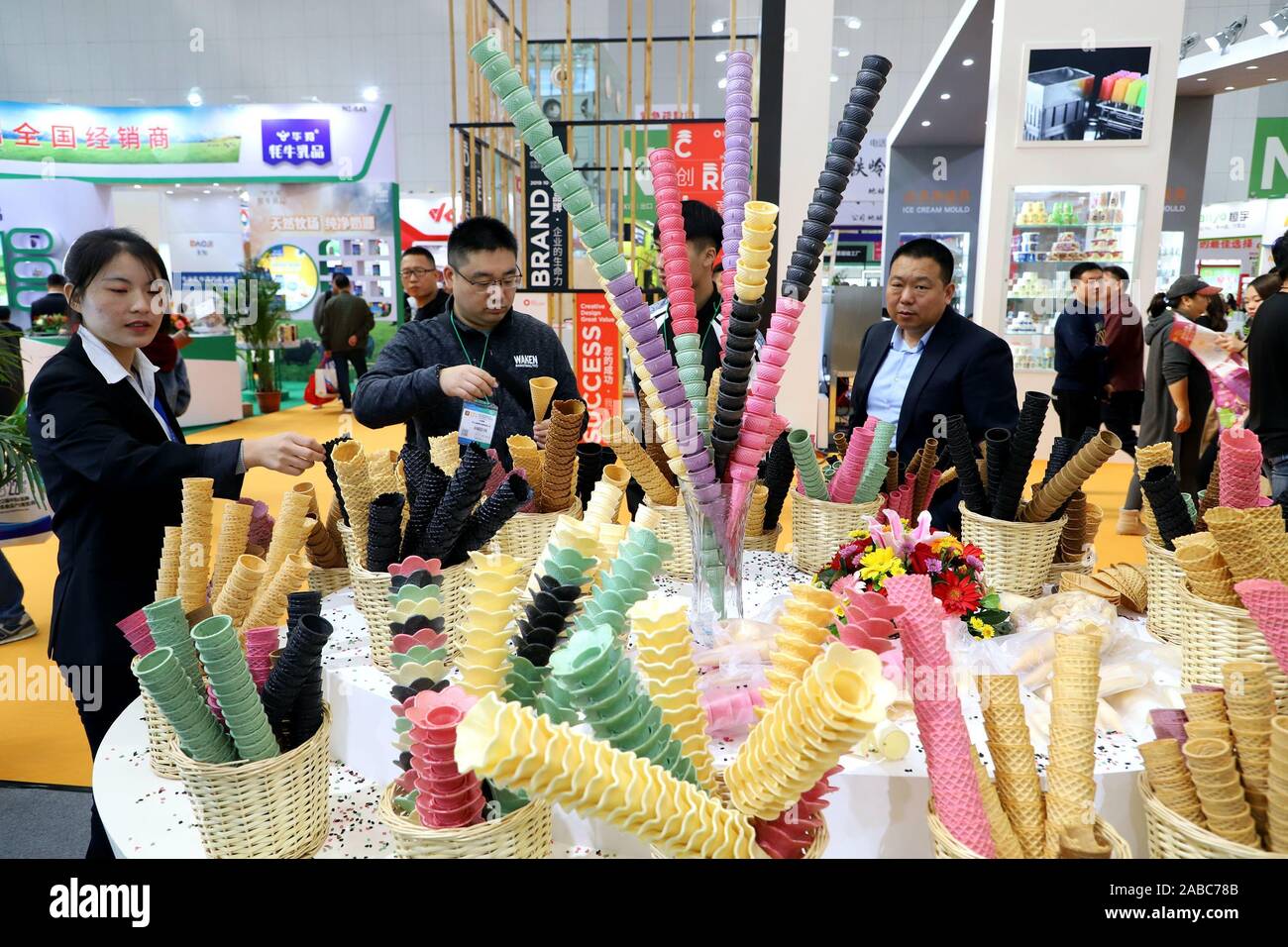 People look at the ice-cream at the 22nd Ice-cream and Frozen Food ...
