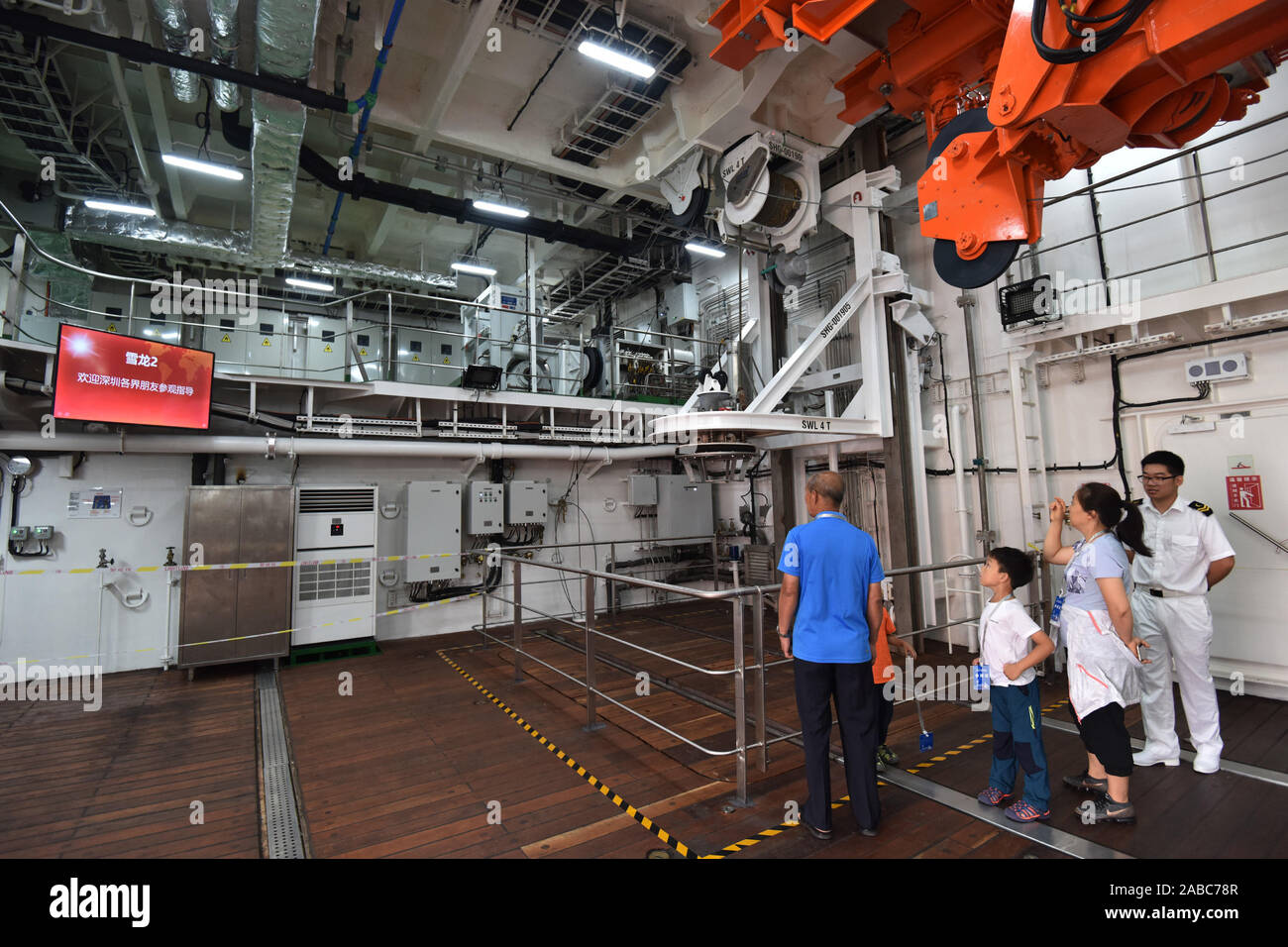 Local citizens visit the Xue Long 2 at Shekou Cruise Center in Shenzhen ...