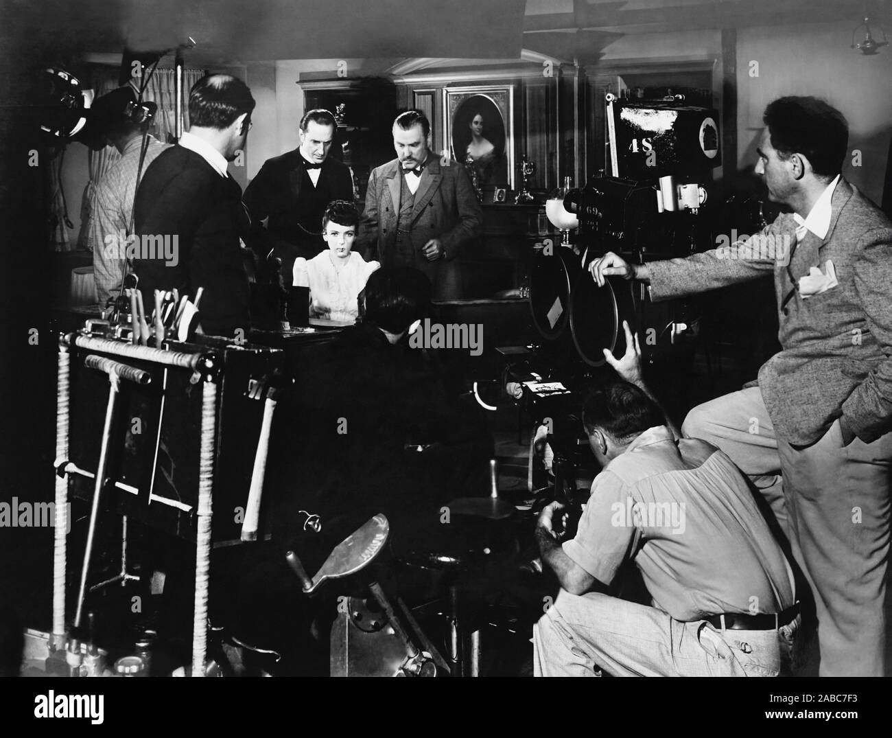 THE ADVENTURES OF SHERLOCK HOLMES, from left: director Alfred L. Werker ...